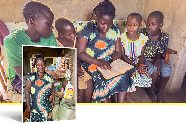 Asiimwe, reading with her children